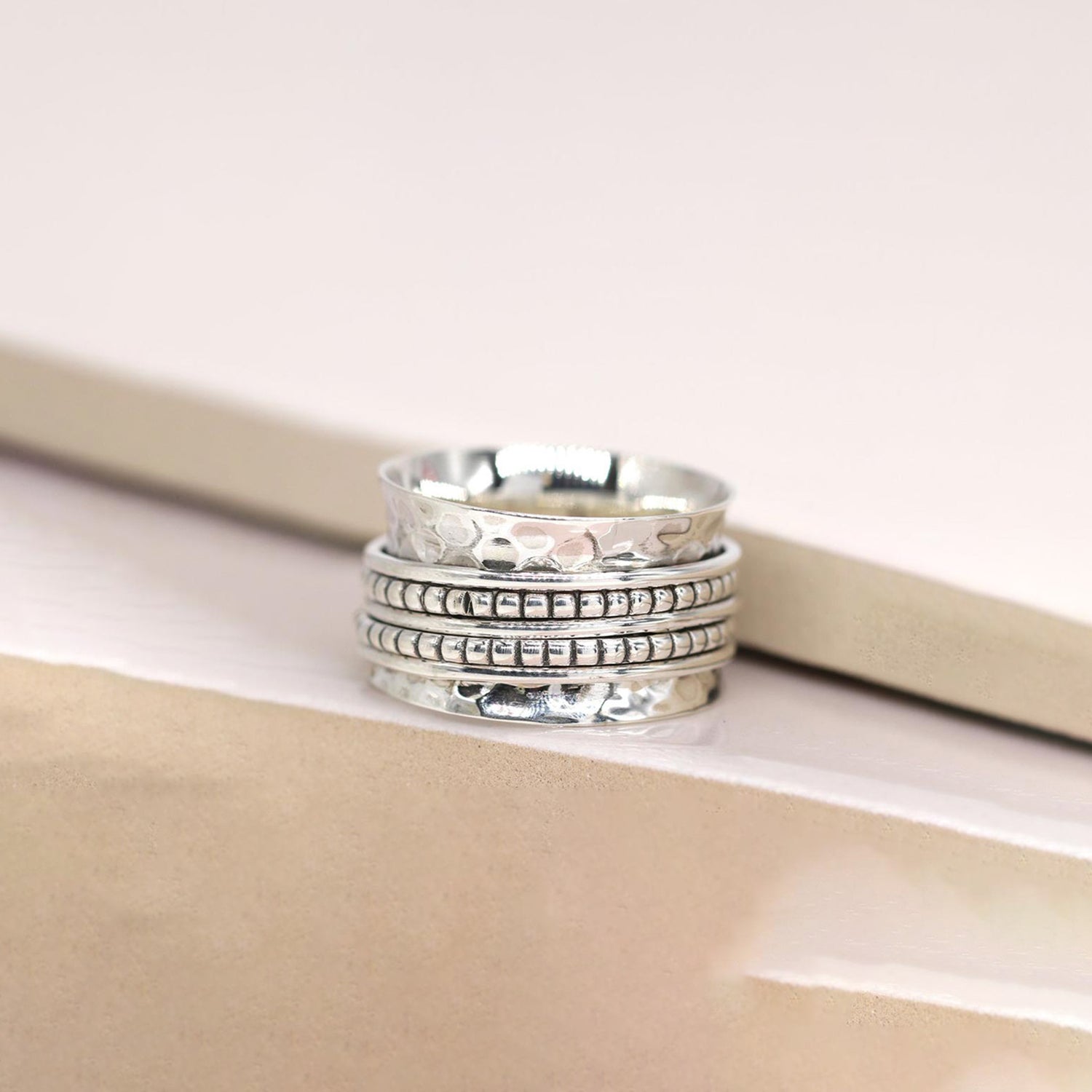 POM Dotted Bands Hammered Spinning Ring, Silver - McElhinneys