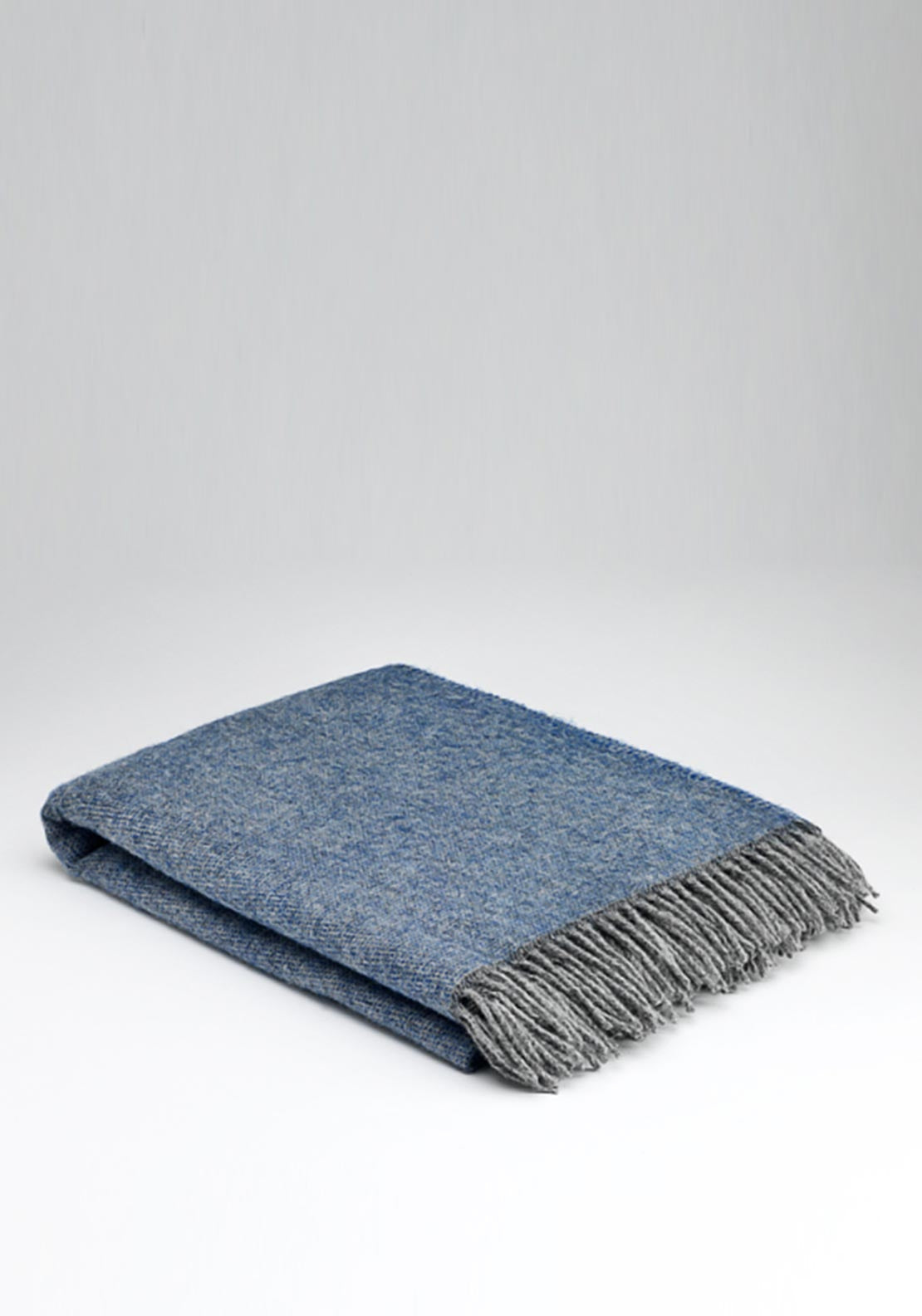 McNutt of Donegal Periwinkle Cosy Fringed Throw - McElhinneys